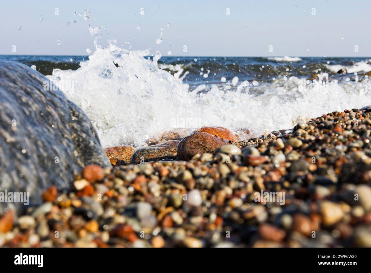 Pebbles on the seashore in close-up. A rocky beach. Stones in close-up ...