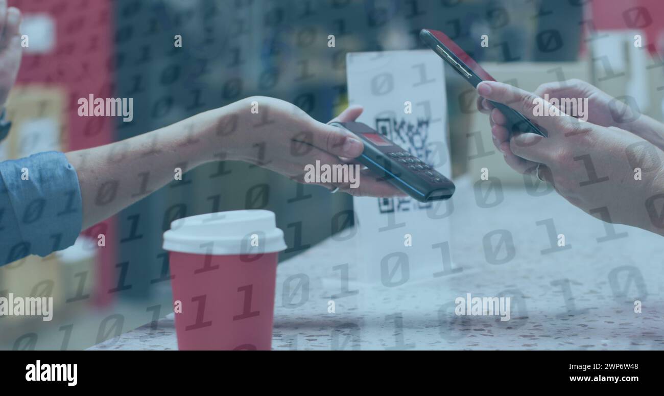 Image of binary coding over two caucasian women paying with smartphone ...