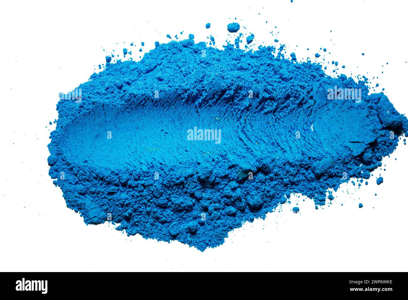 Closeup view of blue Holi powder isolated over a white background. Holi ...
