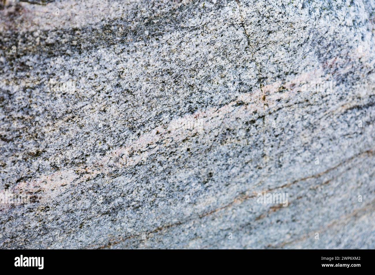 the texture of the granite stone is light gray in color, background ...