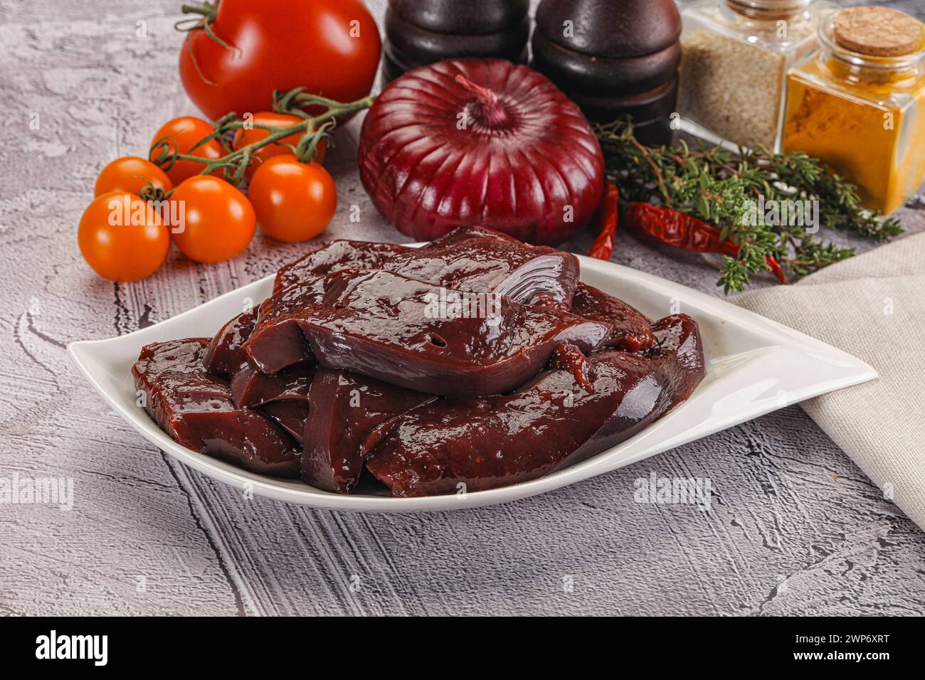 Raw dietary beef liver slices for cooking Stock Photo - Alamy