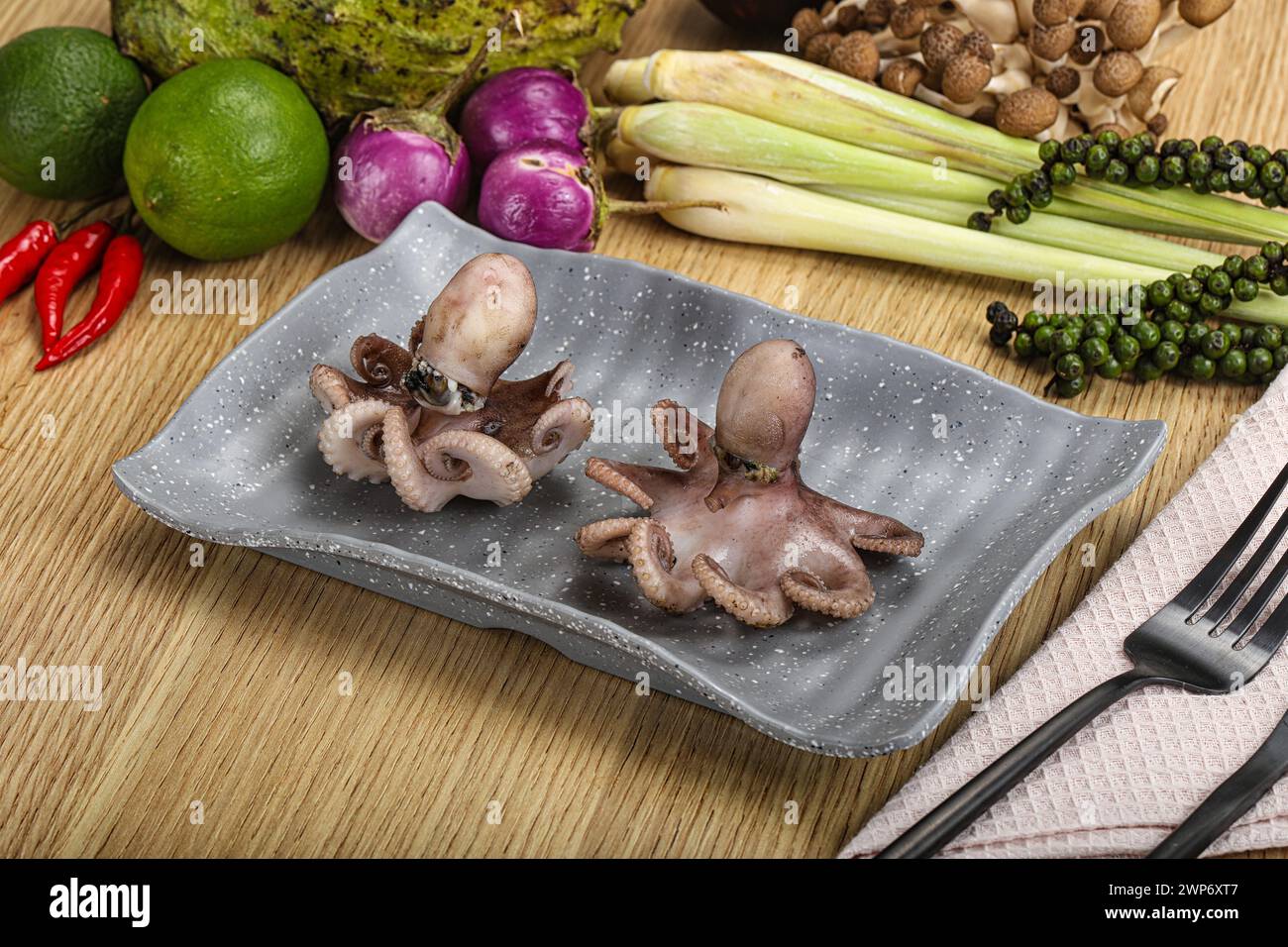 Delicous luxury seafood - boiled octopus in the plate Stock Photo - Alamy