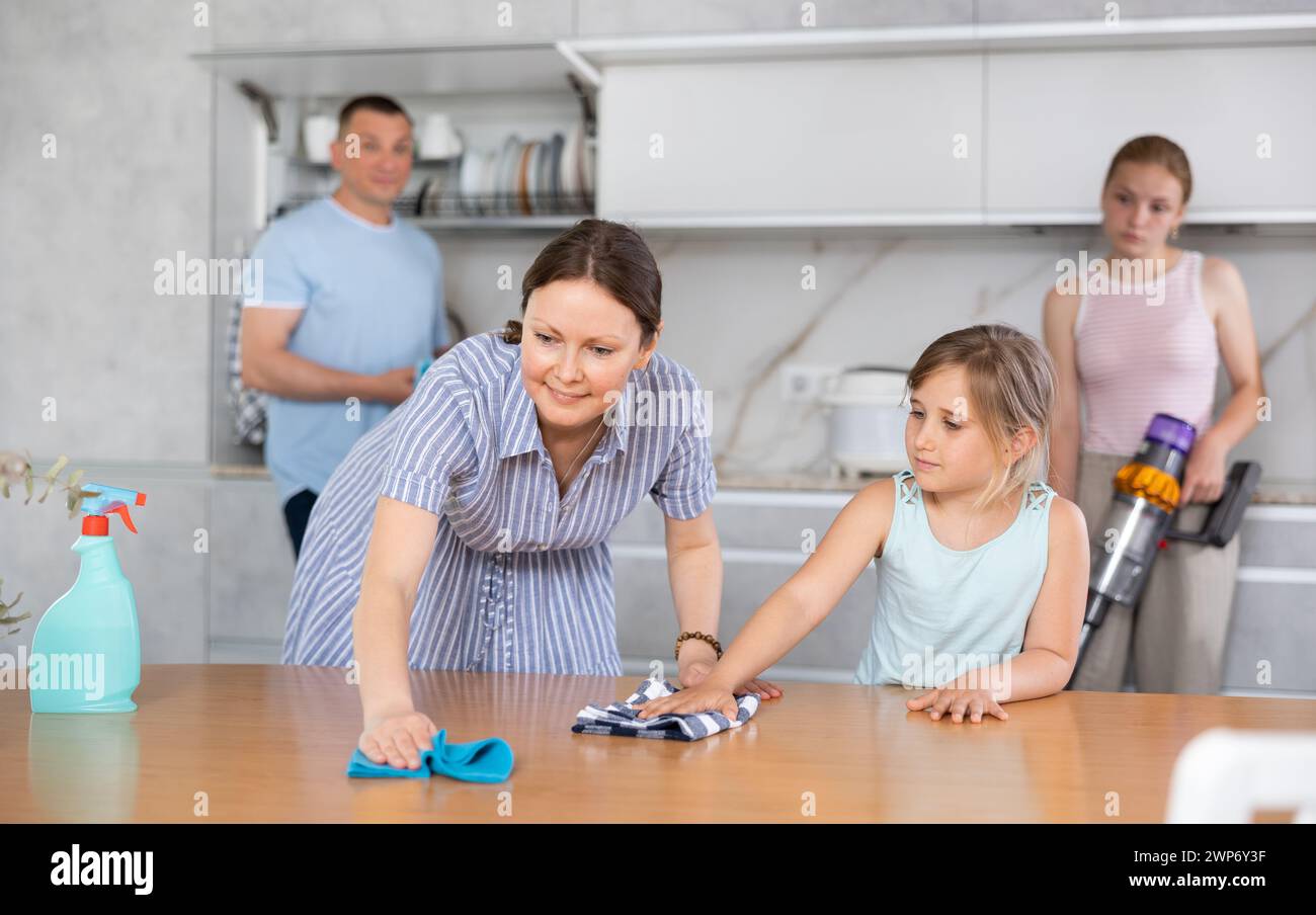 Cleaning together mother vacuuming hi-res stock photography and images ...