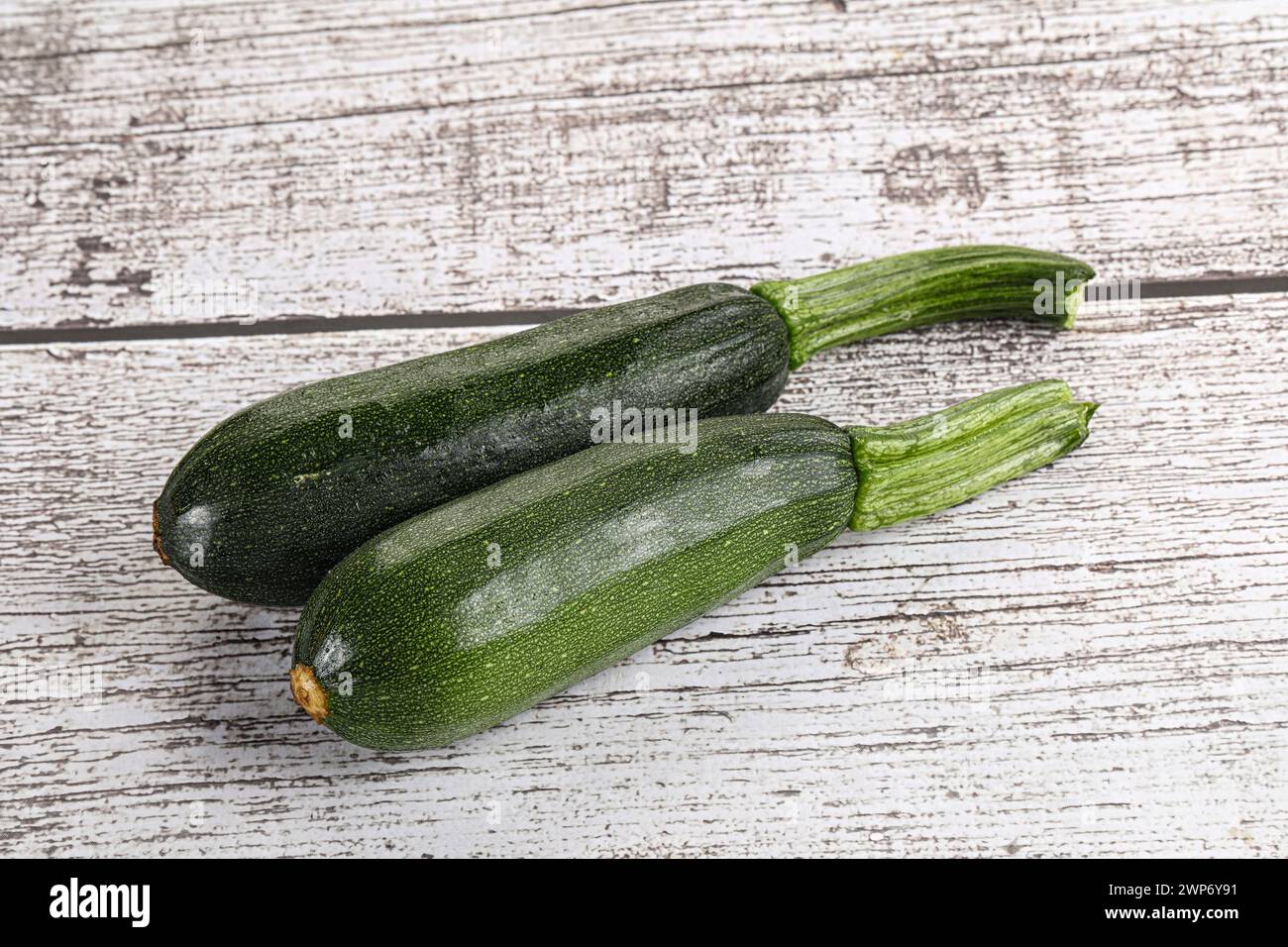 Sliced raw young green zucchini for cooking Stock Photo - Alamy