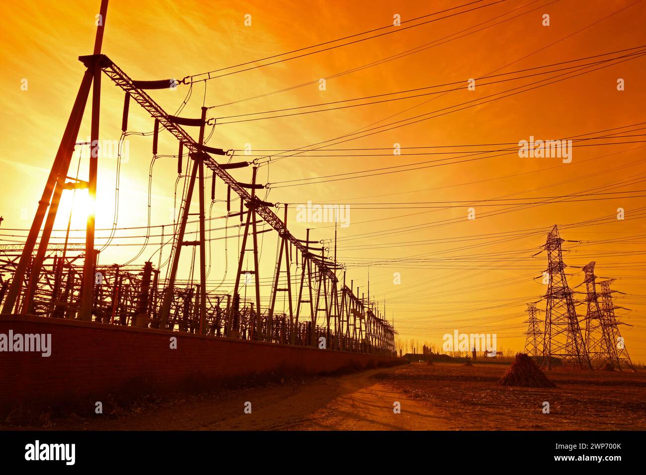 Wire electrical energy at sunset Stock Photo - Alamy