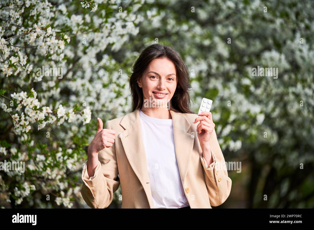 Woman allergic suffering from seasonal allergy at spring. Young happy ...