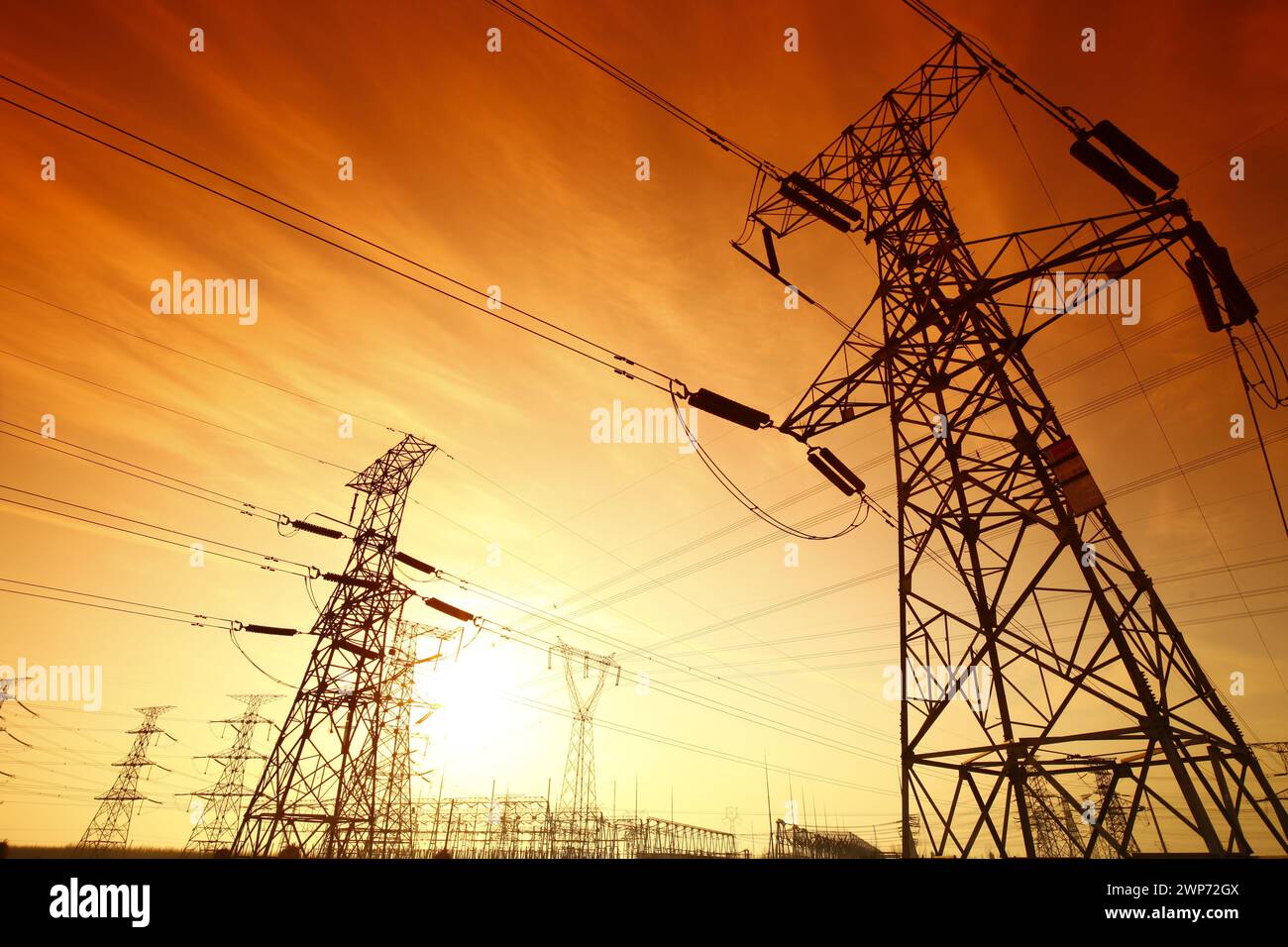 Wire electrical energy at sunset Stock Photo - Alamy
