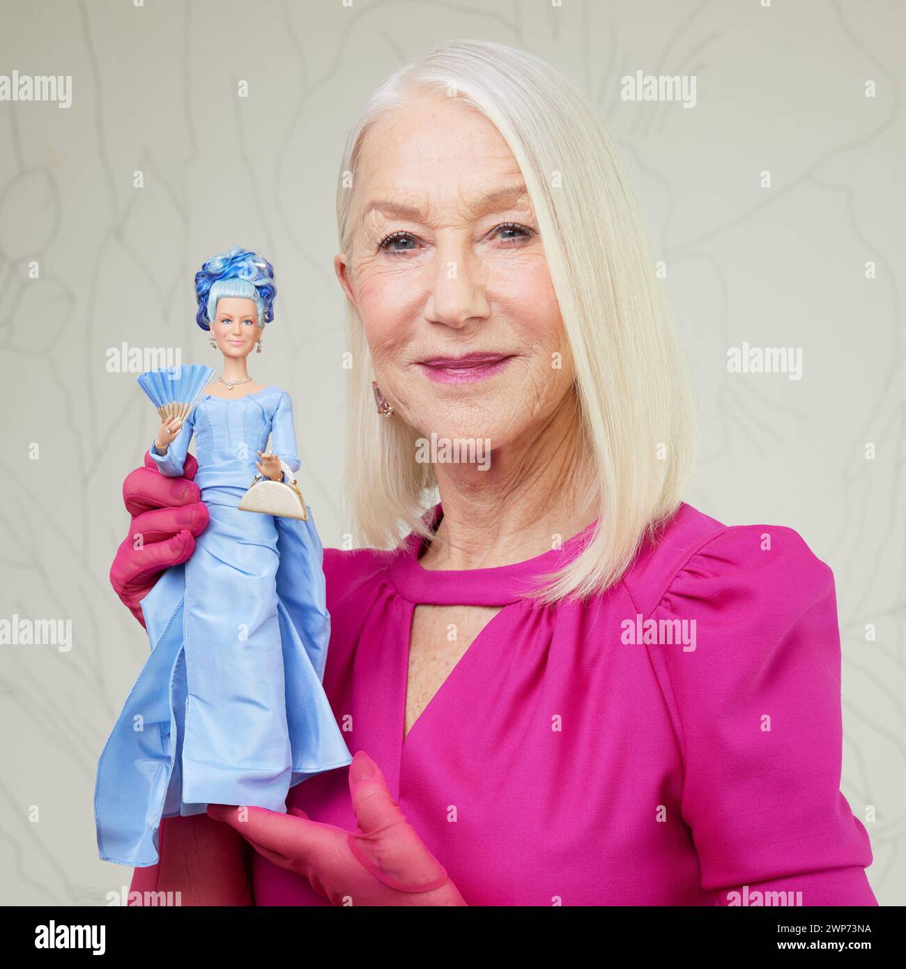 Non Exclusive: Dame Helen Mirren holding her one-of-a-kind Barbie doll ...