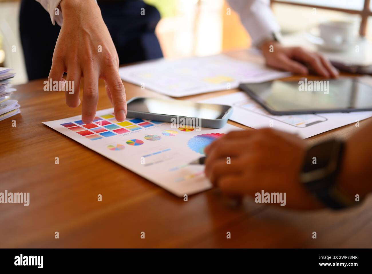 Developer Team Brainstorming For New Mobile App Interface Wireframe