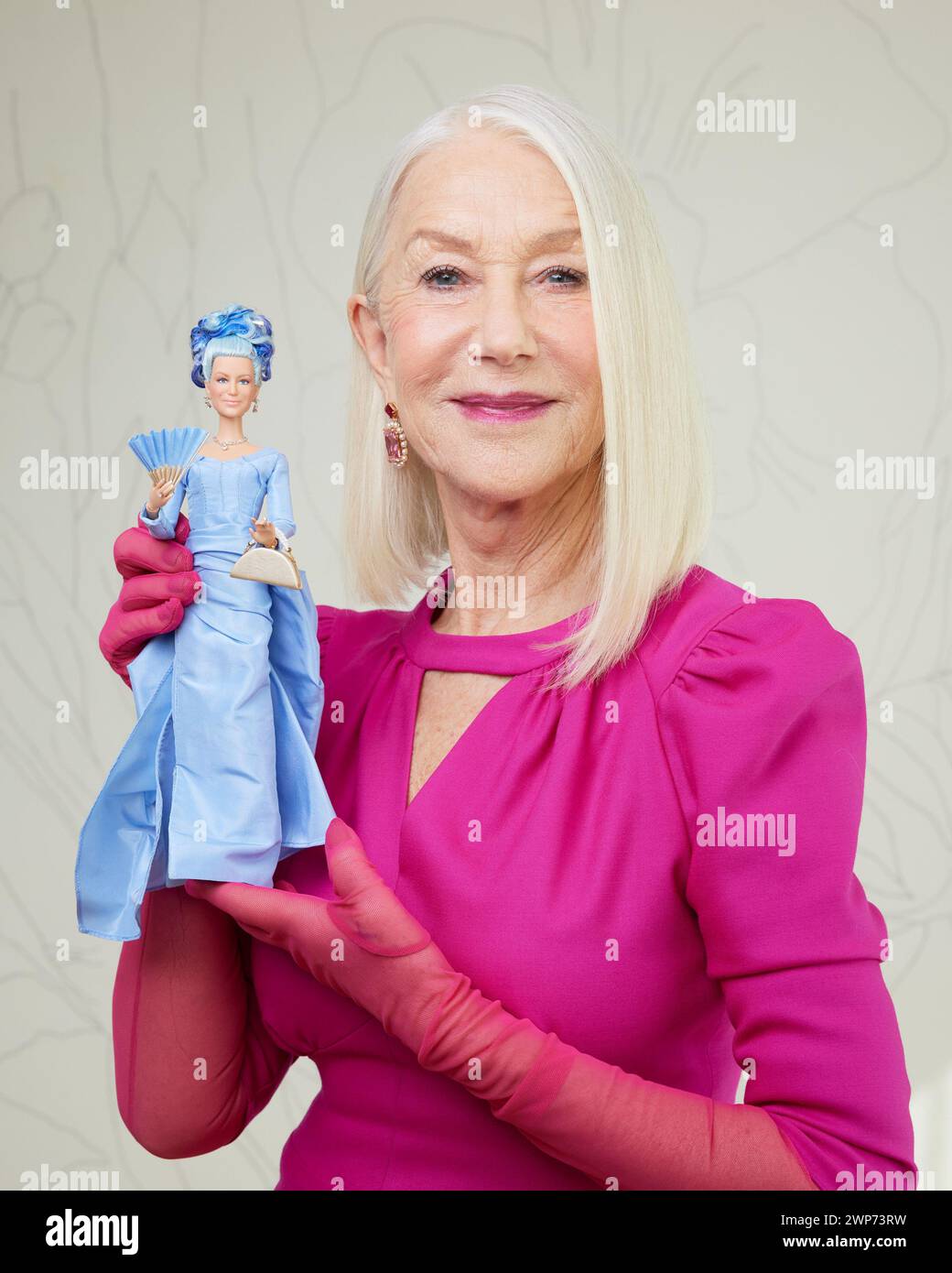 Non Exclusive: Dame Helen Mirren holding her one-of-a-kind Barbie doll ...