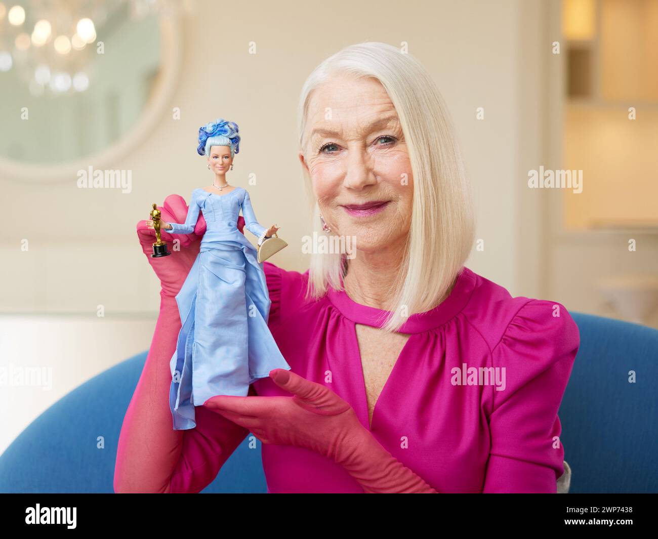 Non Exclusive: Dame Helen Mirren holding her one-of-a-kind Barbie doll ...