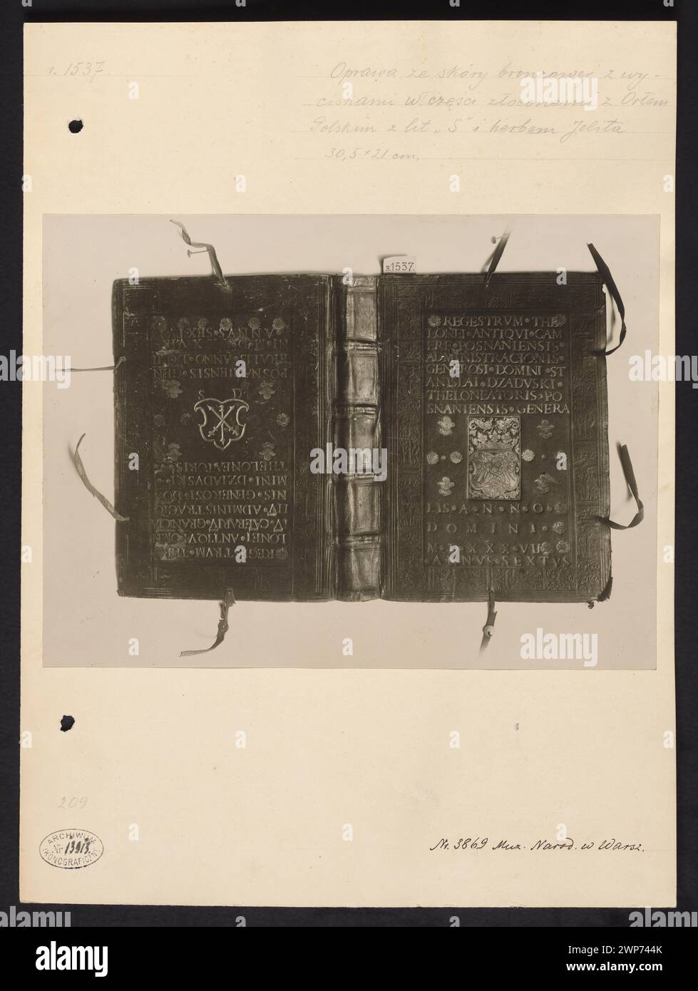 A 1537 book shown after fumulation treatment around 1922, highlighting ...