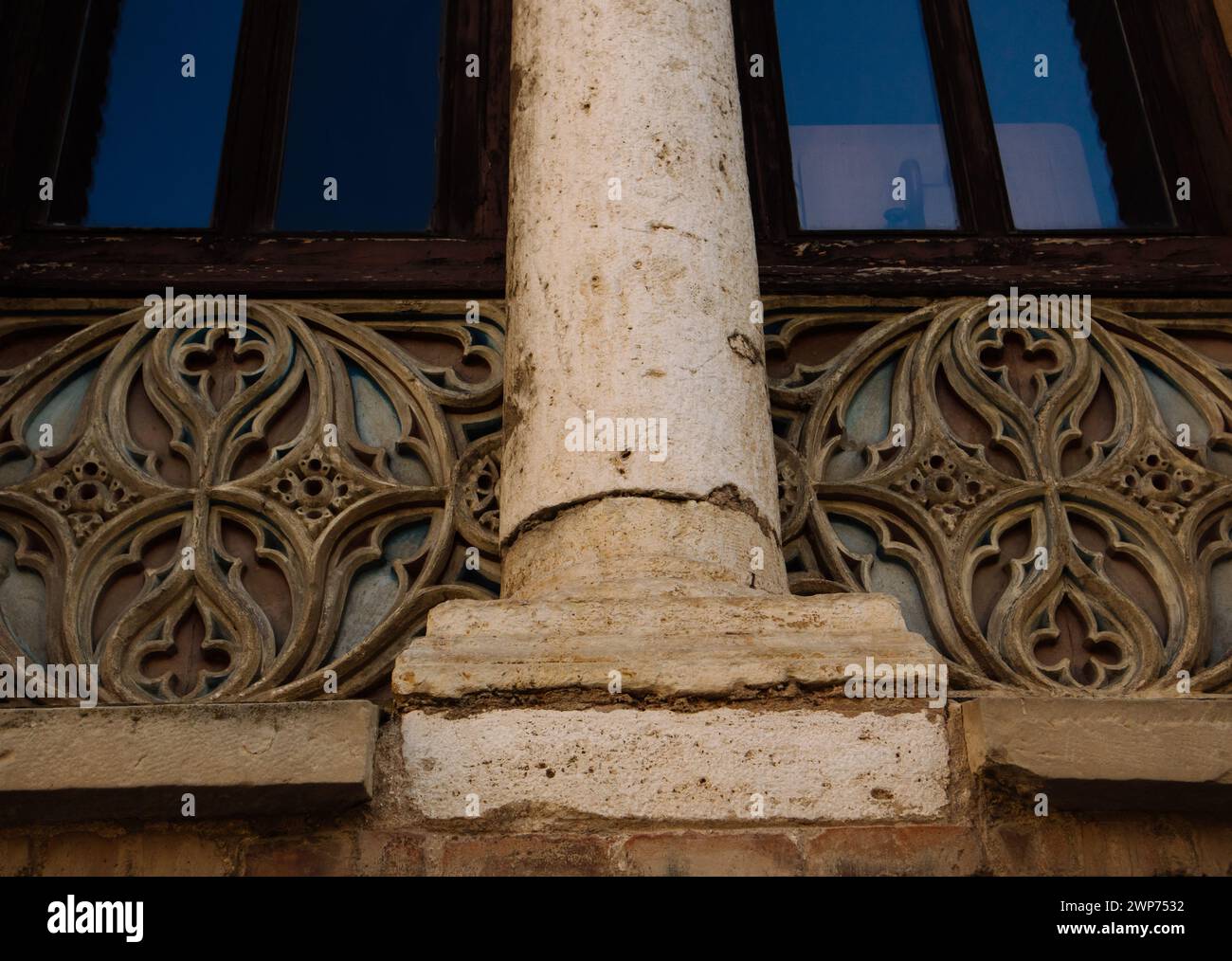 Architectural details. Old vintage historic building with white column ...
