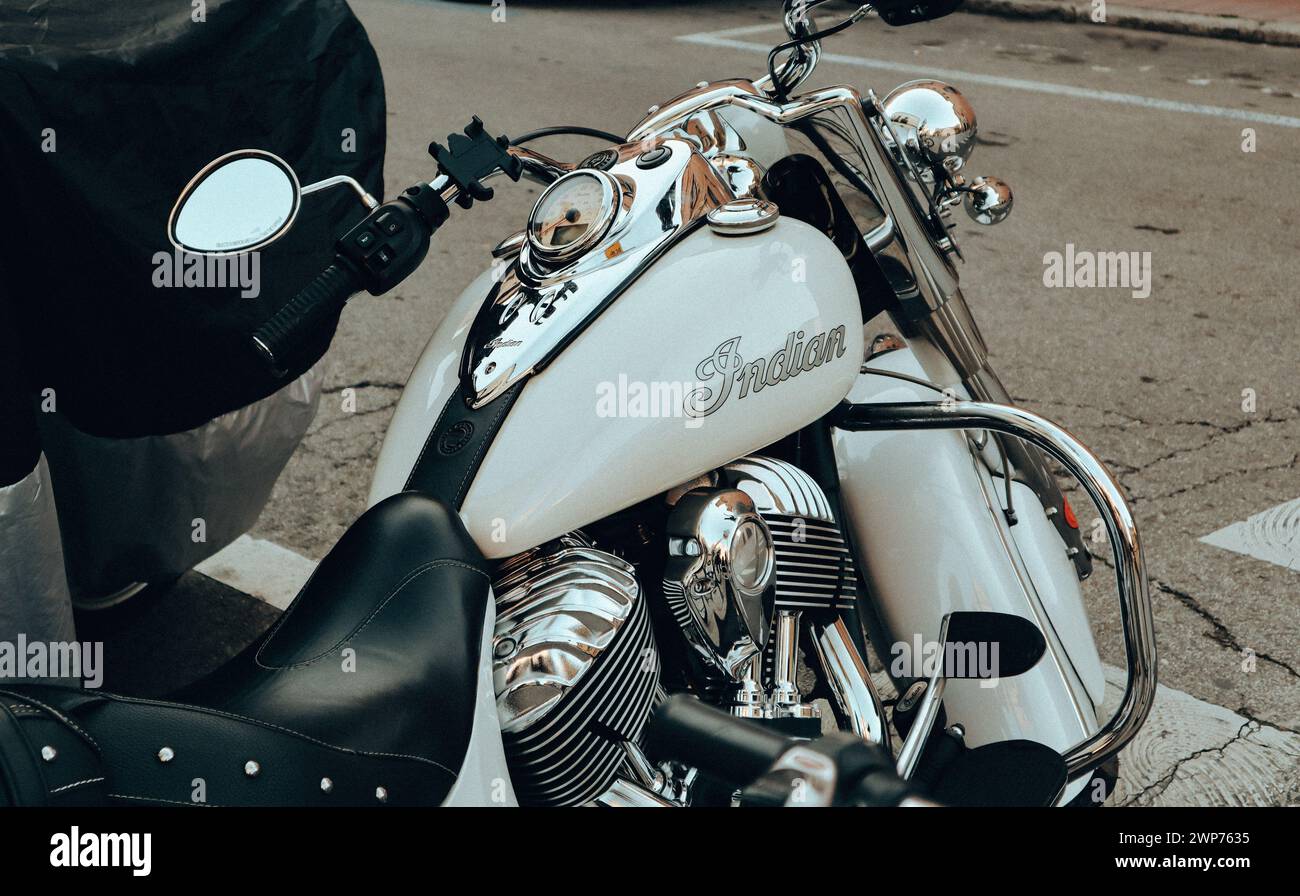 Madrid, Spain. May 1 2023 Indian chief bike. Black and white motorbike is parked on a city ...