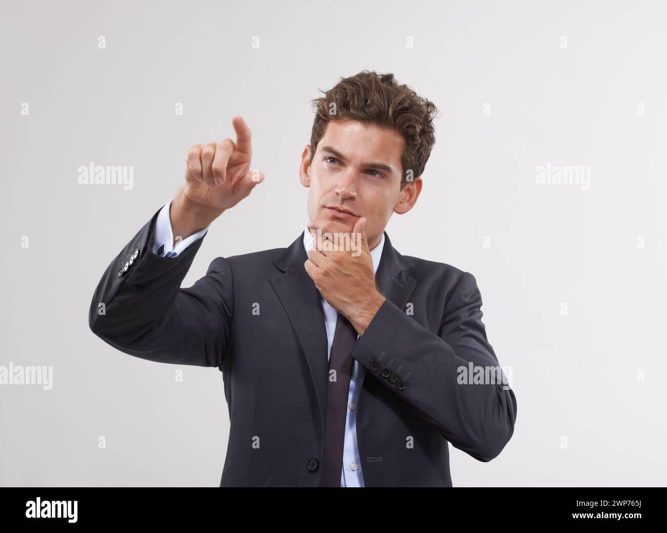 Hand, thinking or businessman on touchscreen in studio on white ...