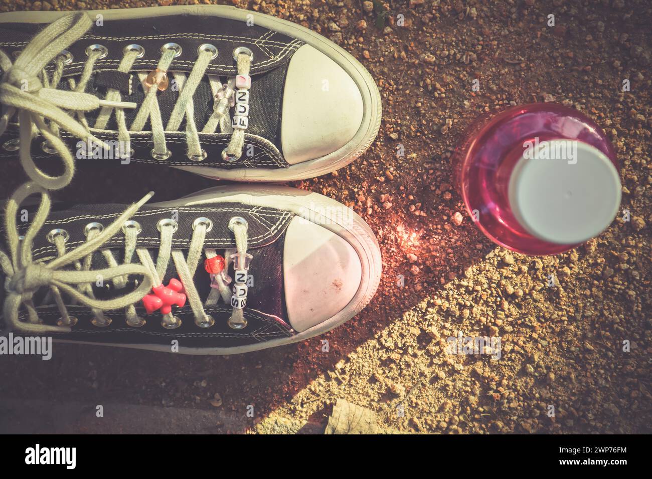 Madrid, Spain. January 7, 2024 Black white pale sneakers Converse on ...