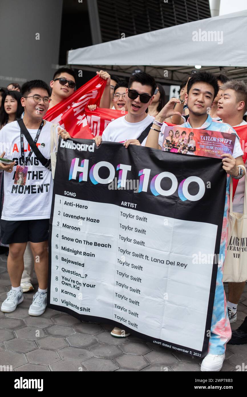4th March 2024. Chinese male fans holding a billboard banner of Tay top ...