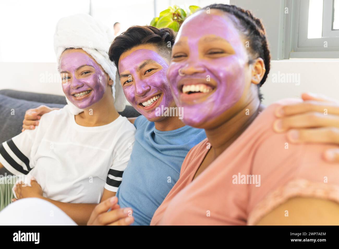 Diverse friends enjoy a spa day at home, with copy space Stock Photo ...