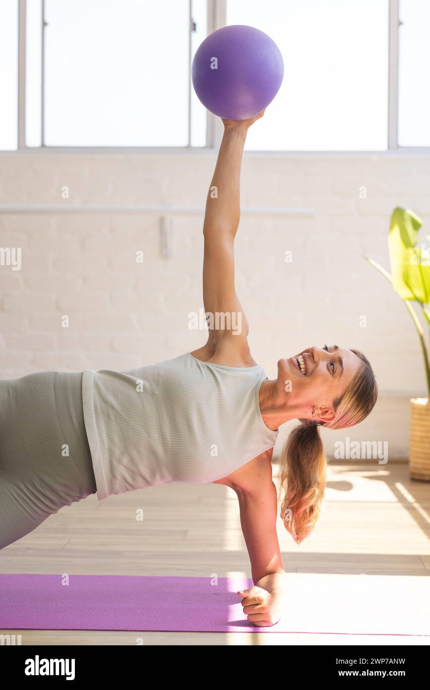 Fitness woman exercises ball hi-res stock photography and images - Alamy