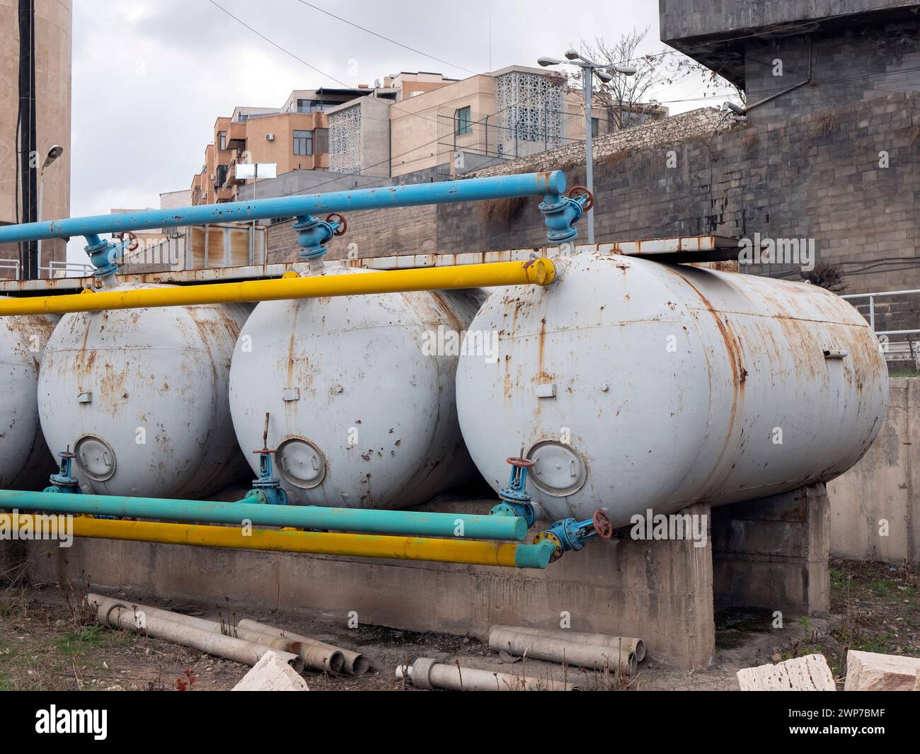 Gas storage cisterns on the background of residential buildings ...