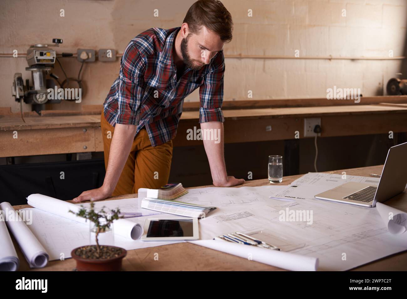 Man, review blueprint and architect with engineering or construction ...