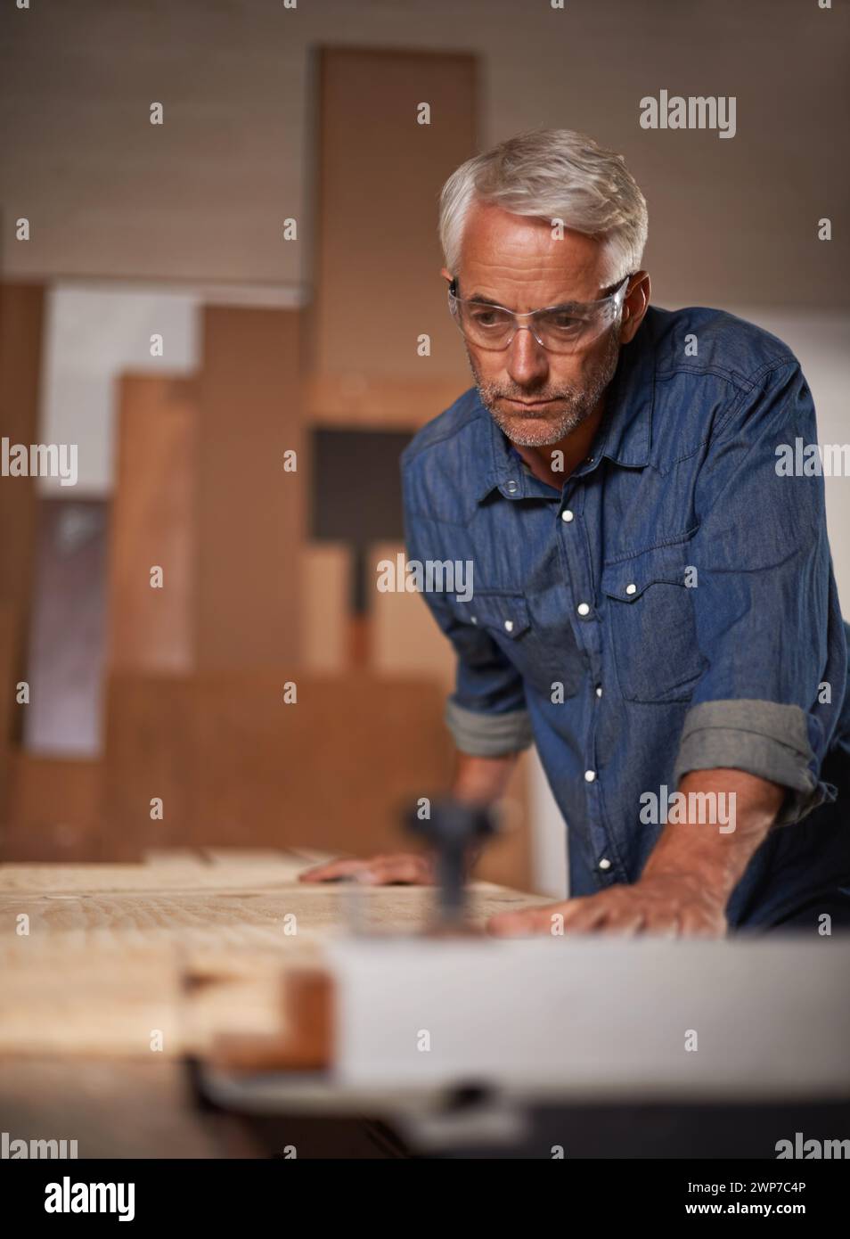 Creative carpenter checking wood material hi-res stock photography and ...
