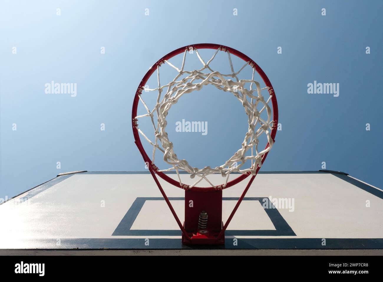 Outdoor public basketball hoop in nature background Stock Photo - Alamy