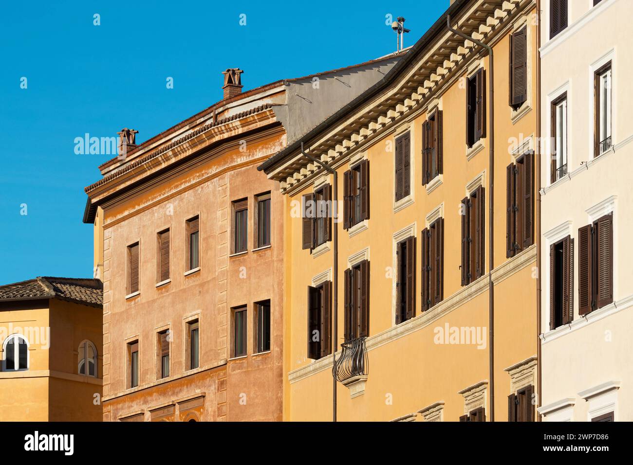 Traditional colored buildings facades in Rome city center. Italy Stock ...
