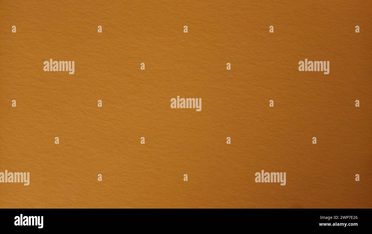 Ocher color background. Colored paper dimly lit in the middle. Light ...