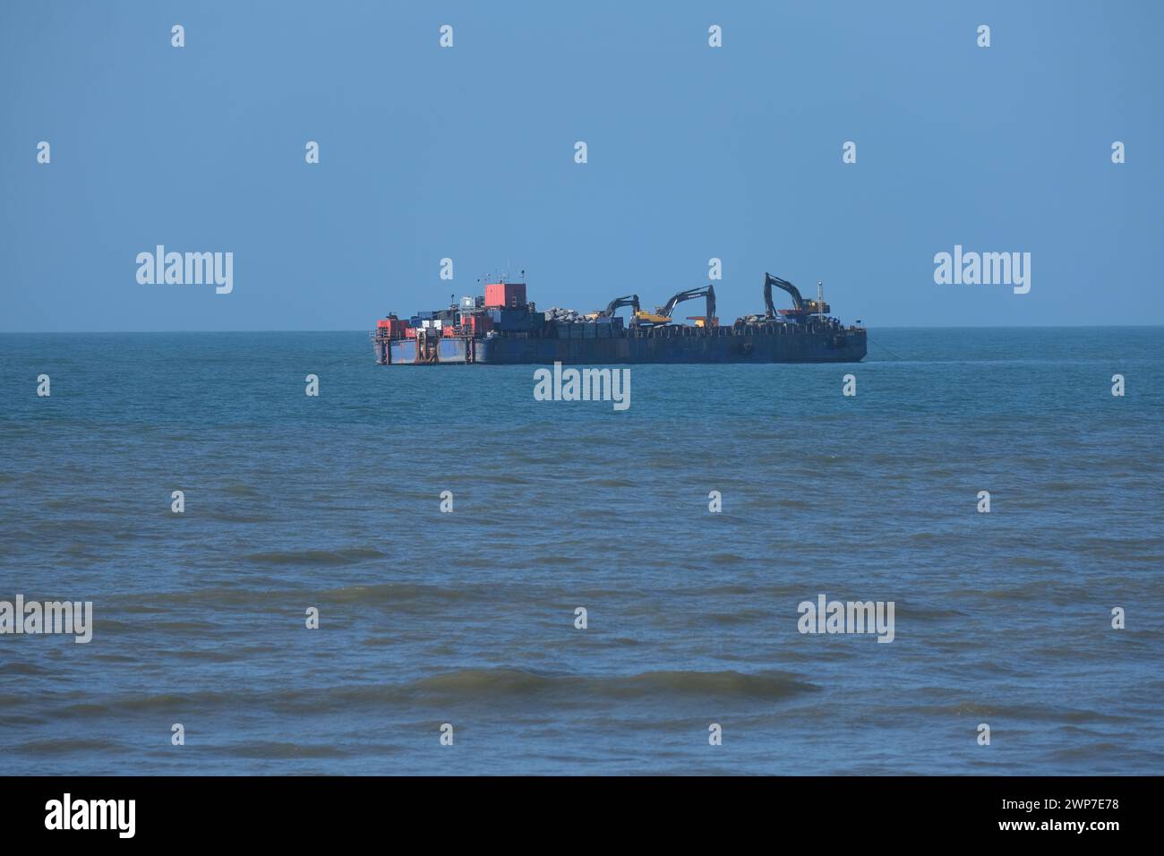 Large barge out at see off the coast at Aberaeron part of the Flood ...
