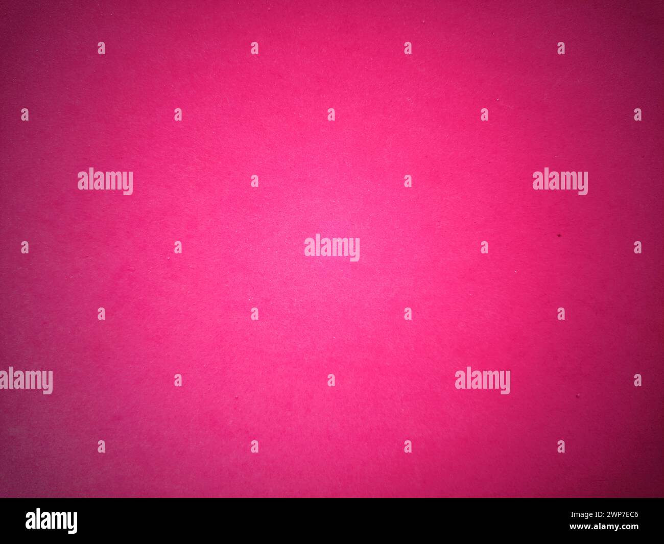 Fuchsia color paper background. Dark light vignetting around the edges ...