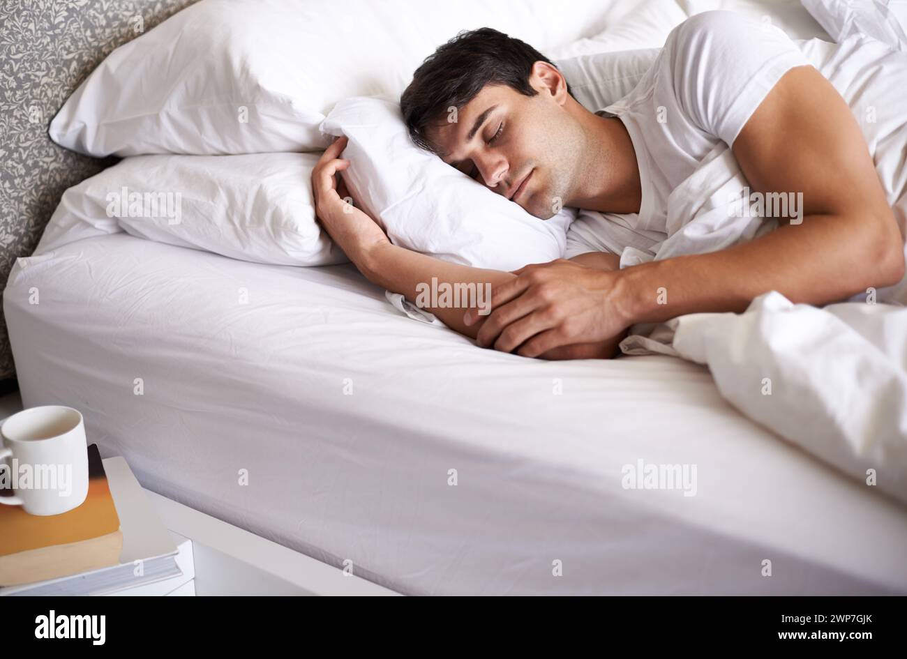 Man, rest and bed for peace, wellness and sleeping in pajamas and ...