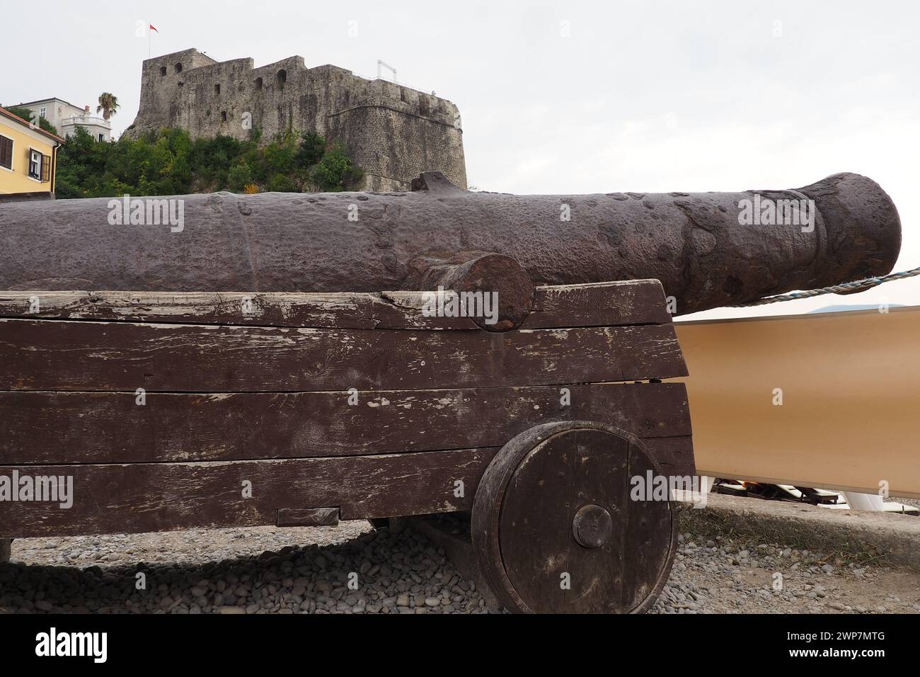 A cannon, a throwing device, a type of artillery gun for firing at a ...
