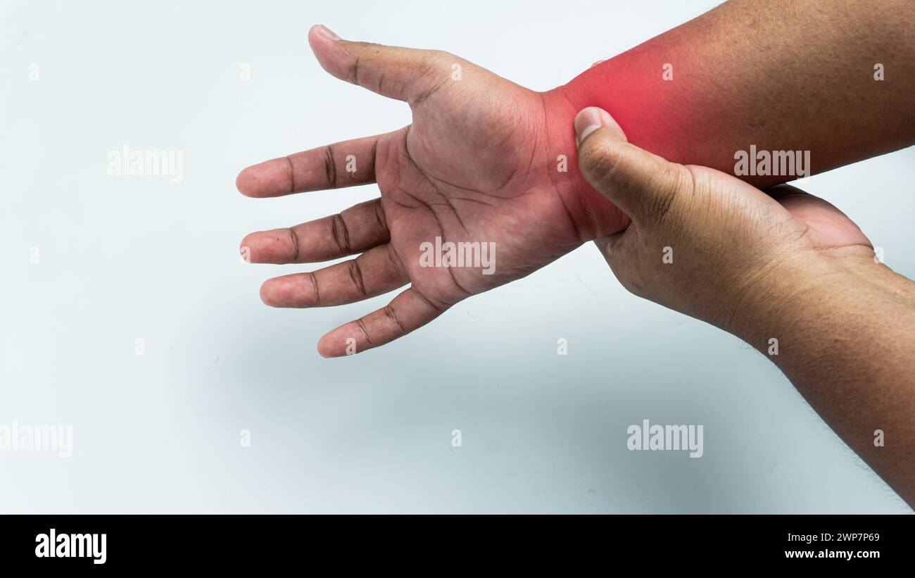 The sore hand that is being held. The sore wrist has a red mark in the ...