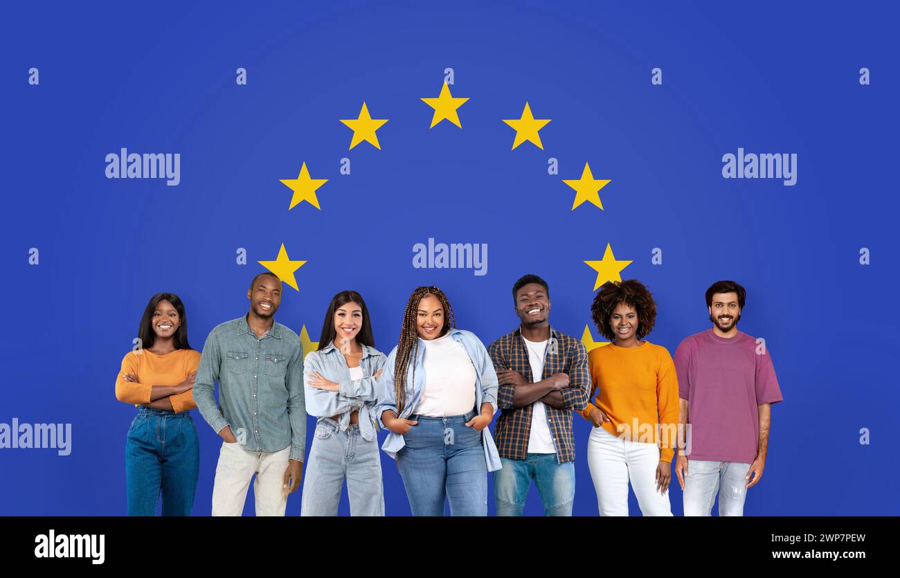 Seven vibrant individuals stand confidently with arms crossed, smiling ...