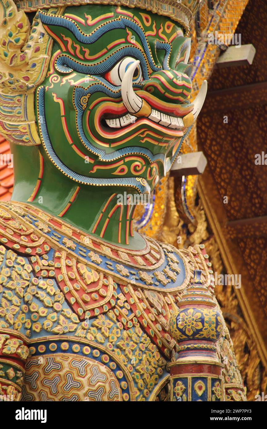 An Asian-style painted face statue with intricate design Stock Photo ...