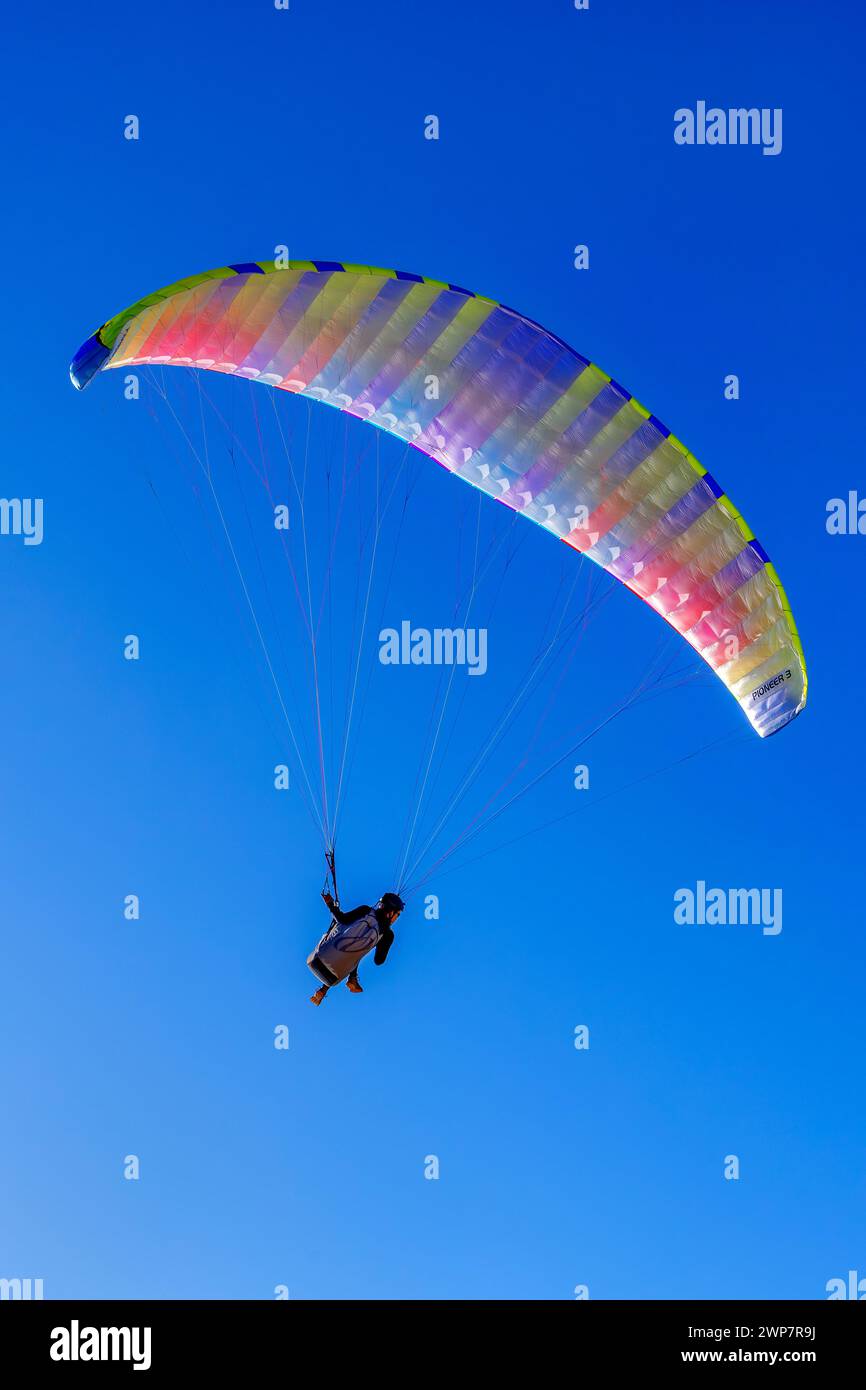 Paraglider soaring through sky hi-res stock photography and images - Alamy