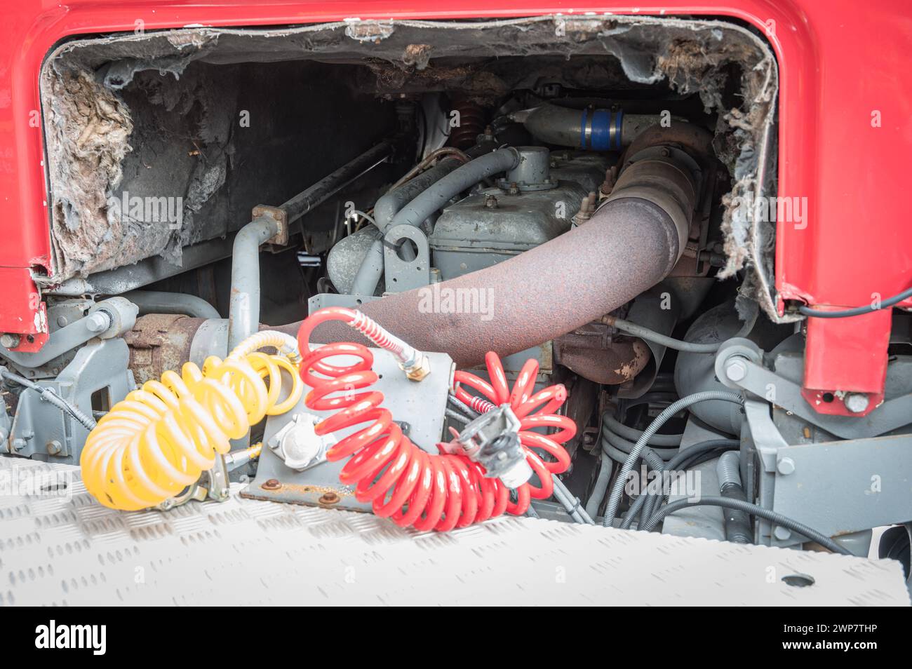 Detail of mechanics in the rear, large v8 engine under the cabin and ...