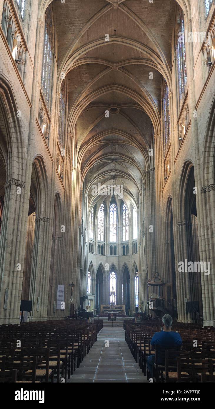 Rocamadour church in France from the central aisle. The altar has a ...