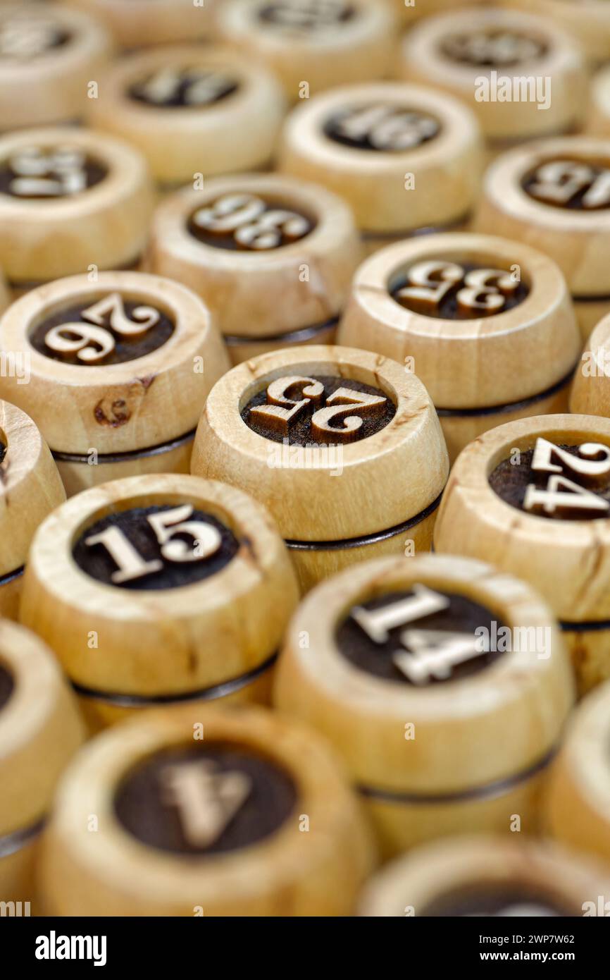 Big group of wooden lotto barrels with numbers, abstract random numbers ...