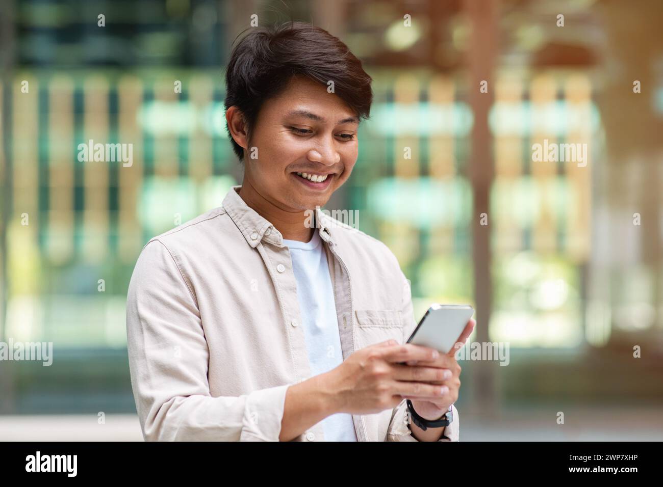 Positive asian male office hi-res stock photography and images - Alamy
