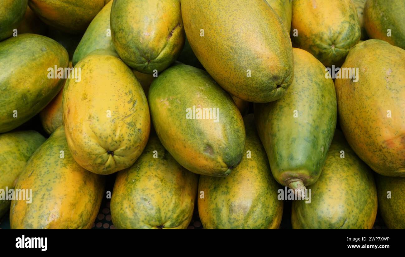 papaya fruits texture as natural food background Stock Photo - Alamy