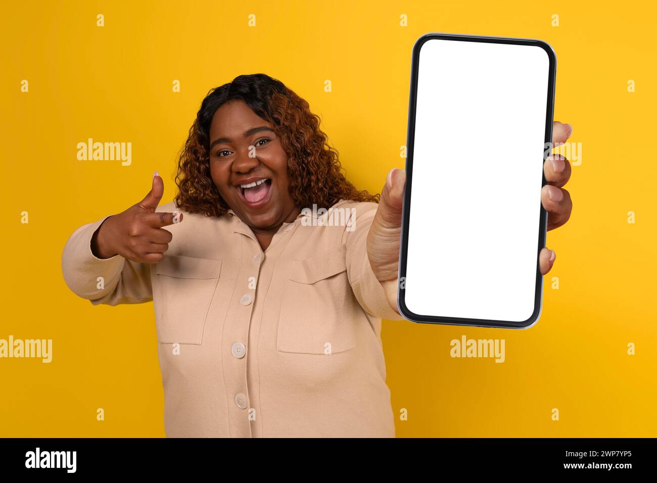 Chubby Black Woman Showing Big Smartphone With White Blank Screen Stock ...