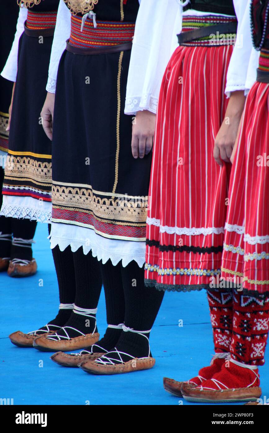 A Balkan folk dance performance by a costumed group Stock Photo - Alamy