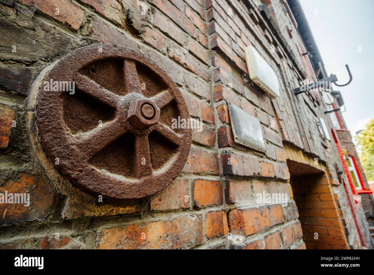 Metal rusted ankra protects house from damage on wobbly post-mining ...