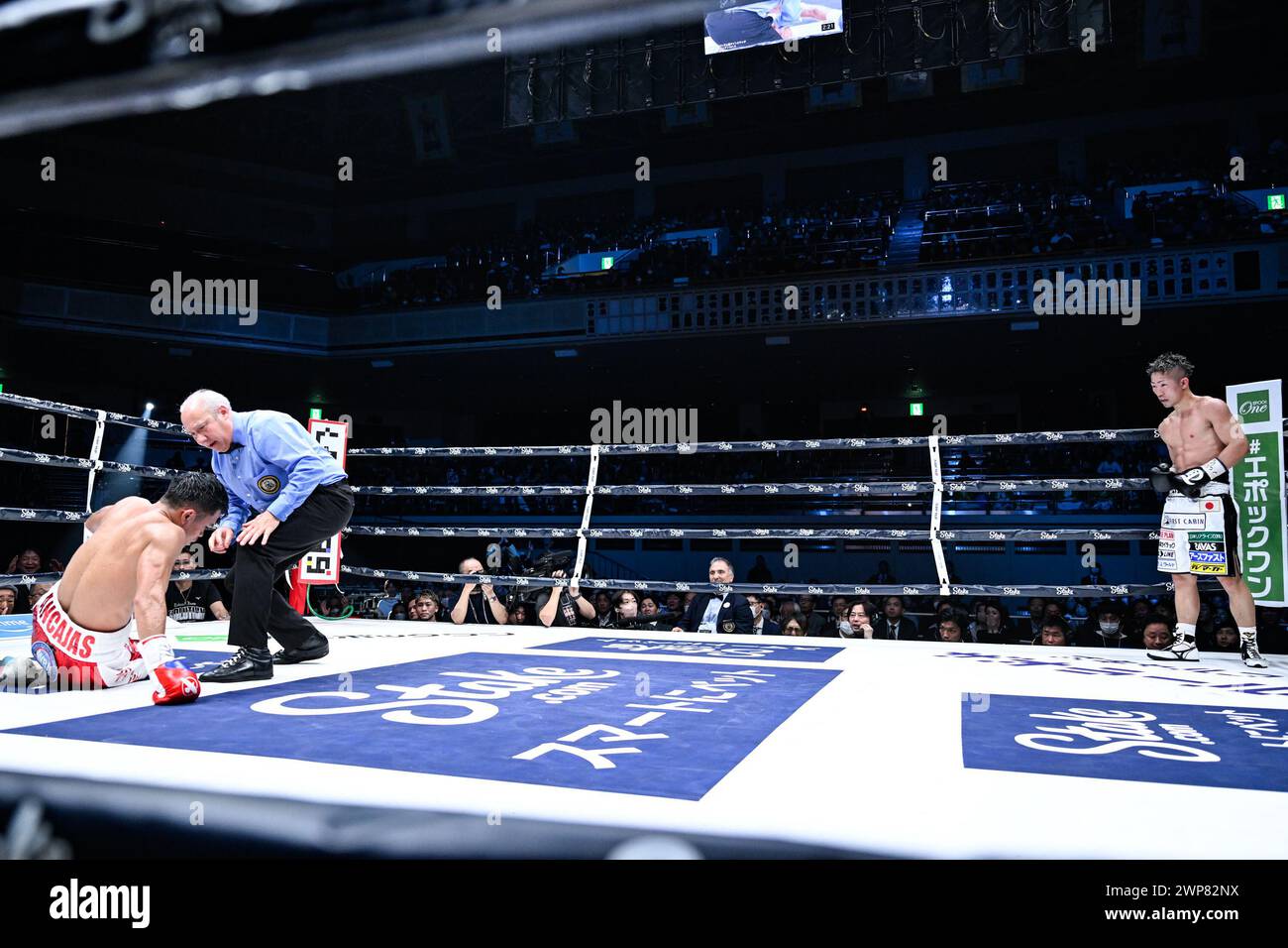 Tokyo, Japan. 24th Feb, 2024. Japan's Takuma Inoue, right, waits in the ...