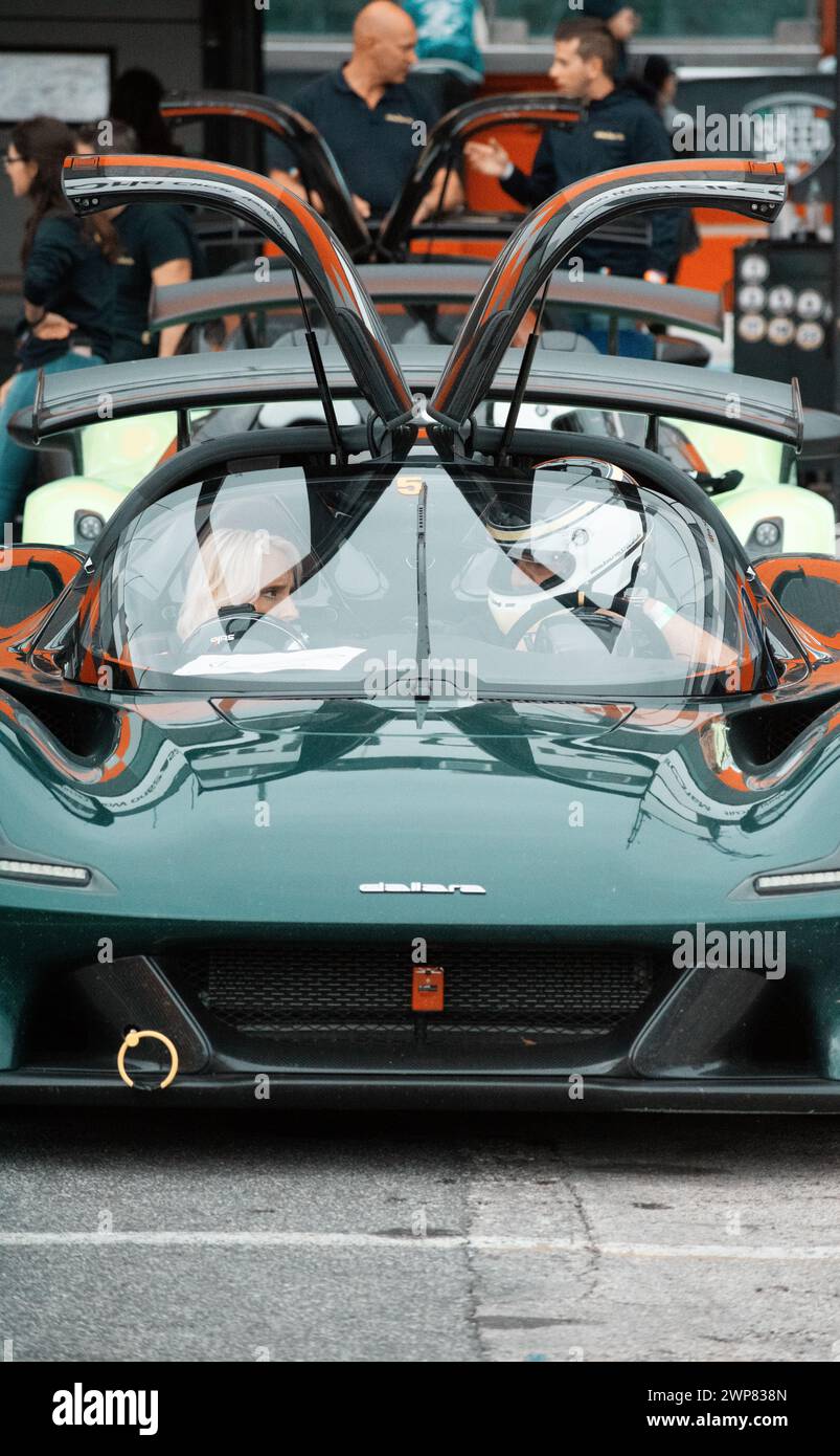 A Race car parked on a road Stock Photo - Alamy