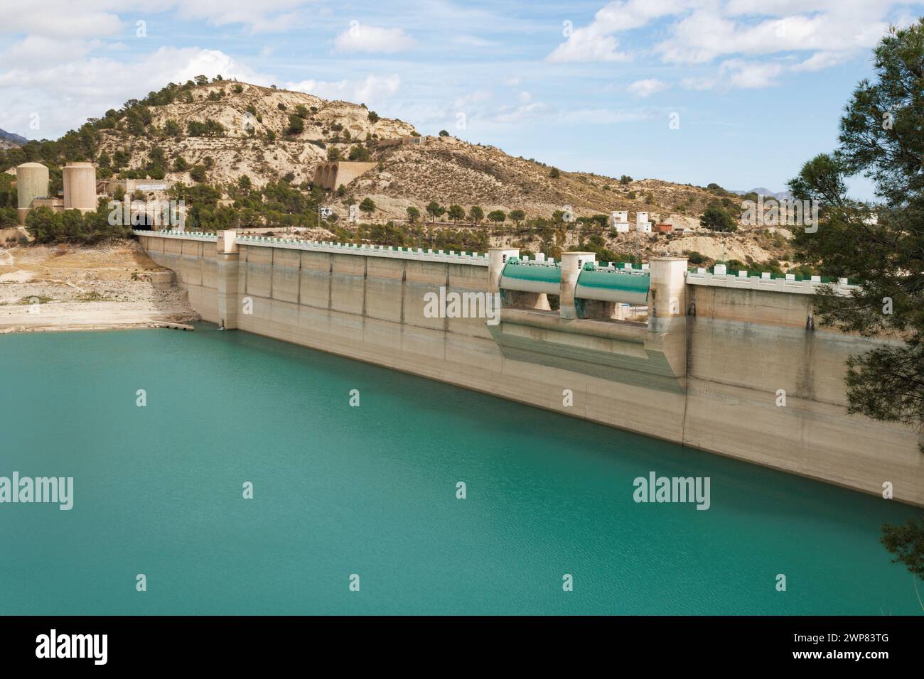 Landscape with the Amadorio reservoir dam in Orxeta and low water level ...