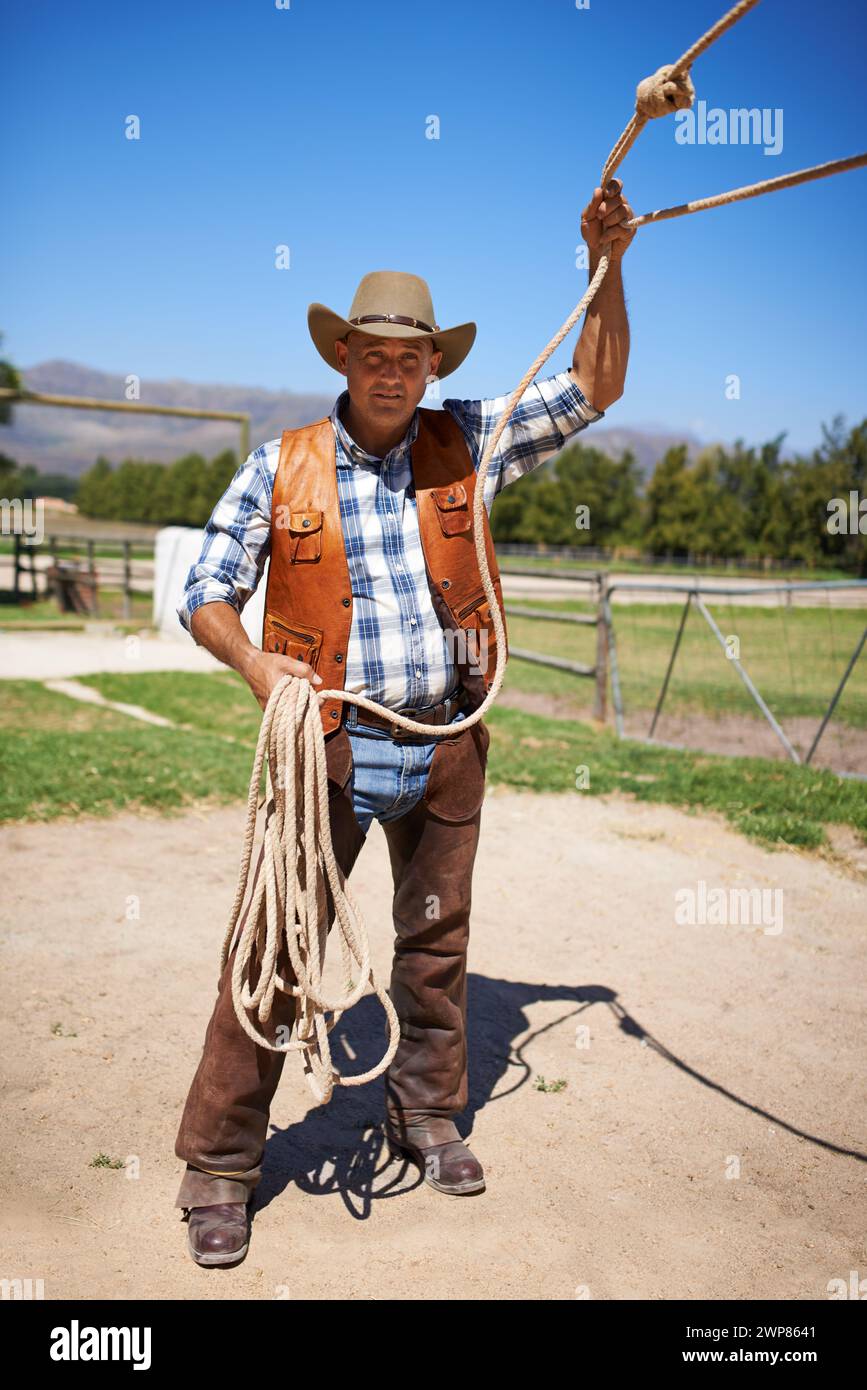 Cowboy, ranch and farmer in outdoor, sun and straps for wrangler and ...