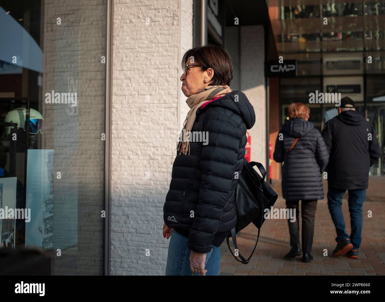 Novara, Italy, Jan 16, 2024: A lady examines a shop window at ...